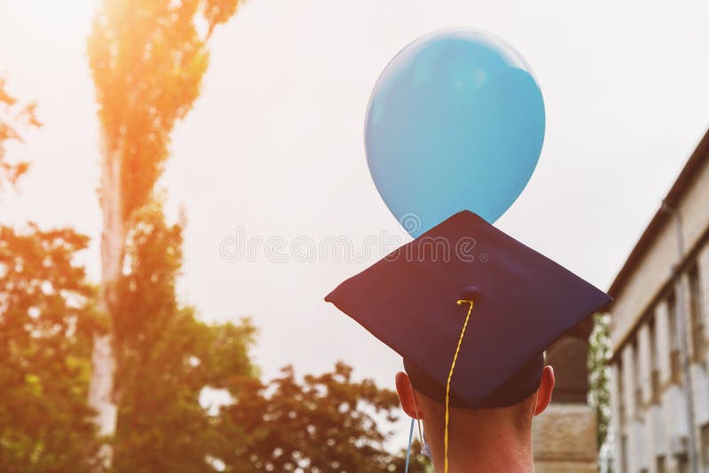 Graduation Day. the Back of a Graduate Wearing Square, Quadrangular ...