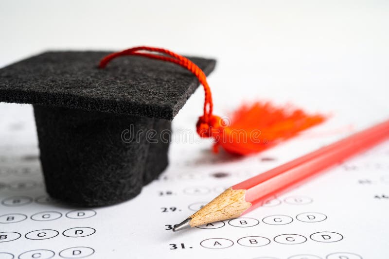 Graduation Gap Hat and Pencil on Answer Sheet Paper, Education Study ...