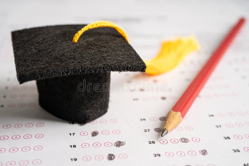 Graduation Gap Hat and Pencil on Answer Sheet Background, Education ...