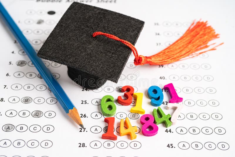 Graduation Gap Hat and Pencil on Answer Sheet Paper, Education Study ...