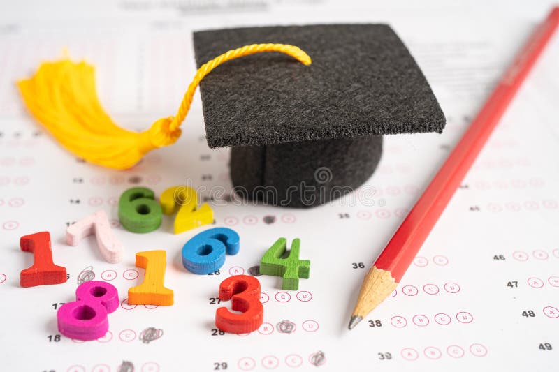 Graduation Gap Hat and Pencil on Answer Sheet Paper, Education Study ...
