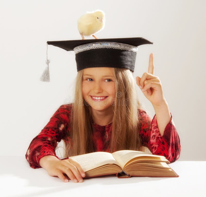 Cute Little Girl Graduation Hat Reading Book Stock Photos - Free ...