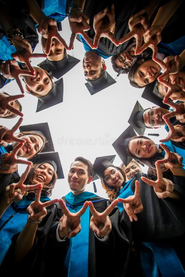 Graduation stock photo. Image of grass, throwing, group - 99709382