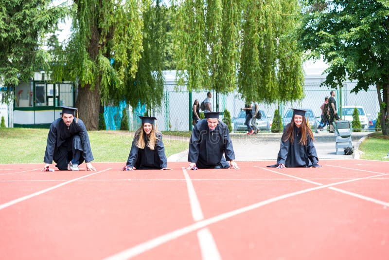 Graduation Group of Students Celebrating on Athletic Track, Prep Stock ...