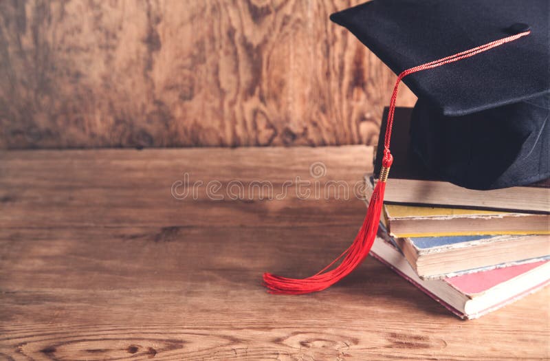 Graduation Hat with Books on Table. Education Concept Stock Photo ...