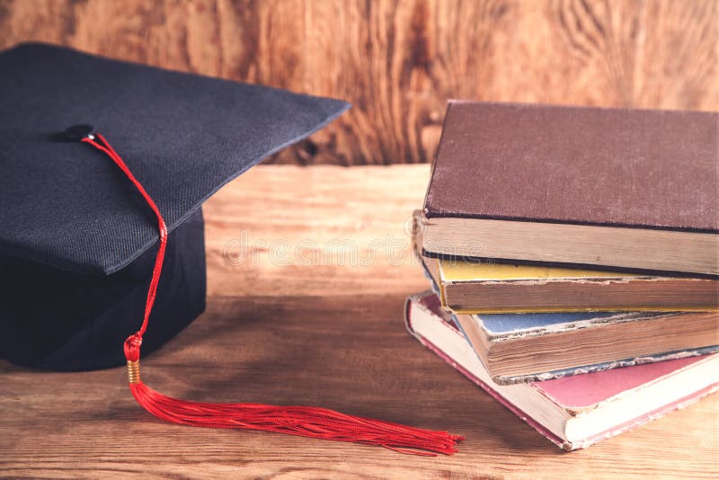 Graduation Hat with Books on Table. Education Concept Stock Photo ...