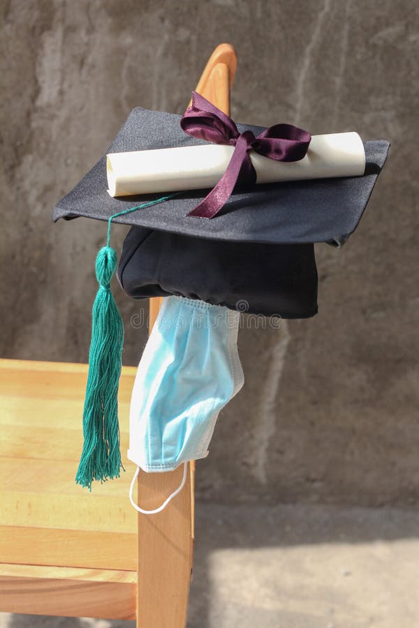Graduation Hat and Diploma Together with Medical Mask Stock Image ...