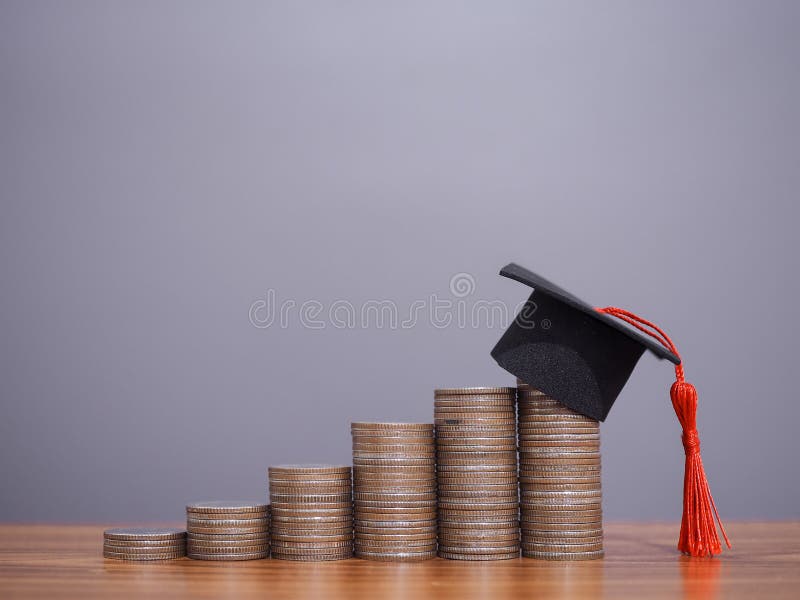 Graduation Hat on Stack of Coins. the Concept of Saving Money for ...
