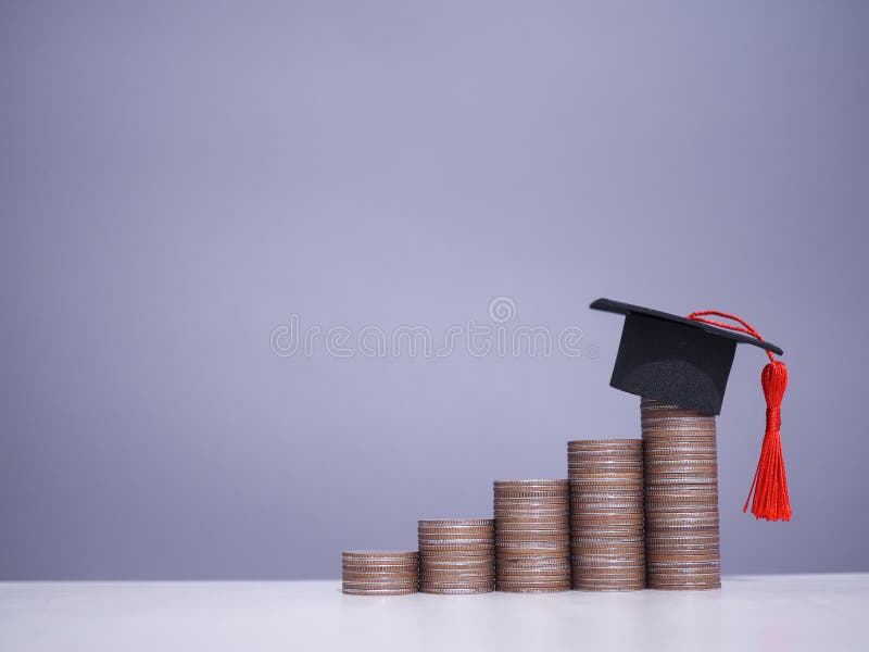Graduation Hat on Stack of Coins. the Concept of Saving Money for ...
