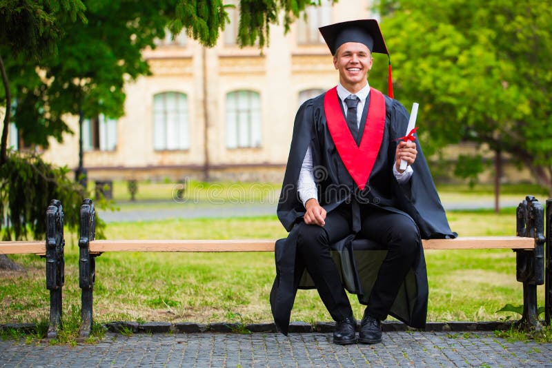 Graduation: Student Standing with Diploma Stock Photo - Image of ...