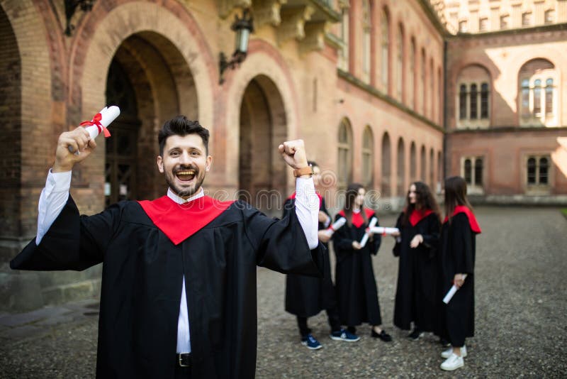 Graduation Young Man in Front of a Group of Graduation Students Stock ...