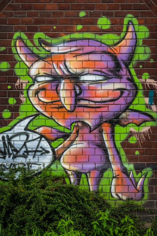 Graffiti art on the wall editorial image. Image of creature - 99165785