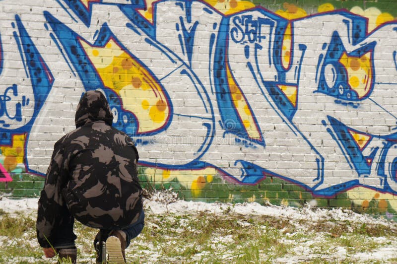 Artist Painted Graffiti on the Wall in Multi-colored Colors Stock Photo ...