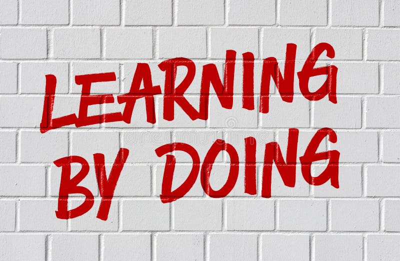 Graffiti on a Brick Wall - Learning by Doing Stock Photo - Image of ...