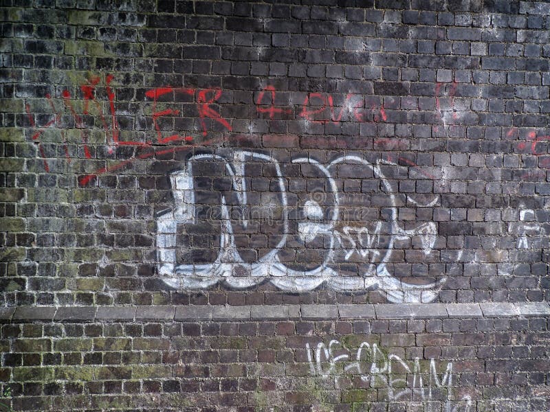 Graffiti on brick wall editorial image. Image of masonry - 110753865