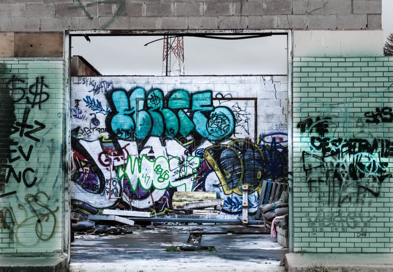 Graffiti on building walls editorial stock photo. Image of building ...