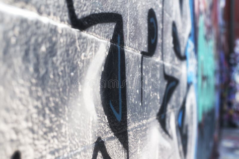 A graffiti covered wall stock photo. Image of painted - 202713868
