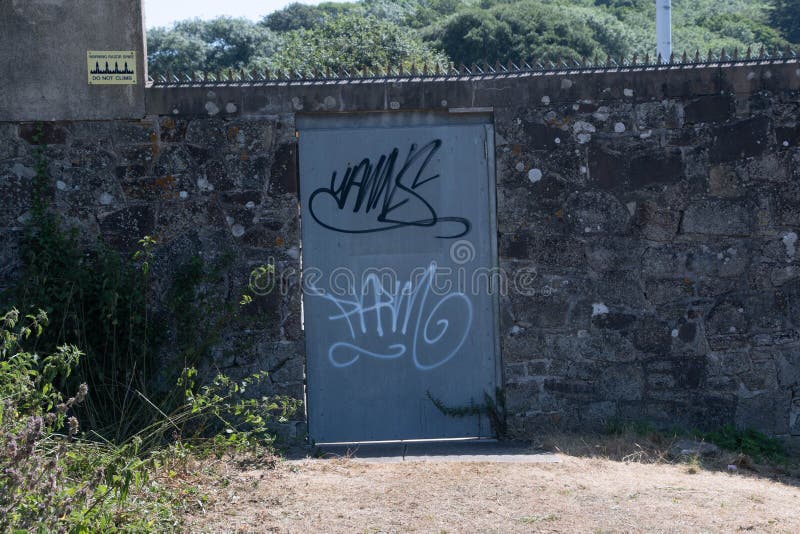 Graffiti on a gate stock photo. Image of wall, aerosol - 120324586