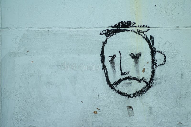 Graffiti, Face of a Sad Looking Man on a Wall Editorial Photo - Image ...