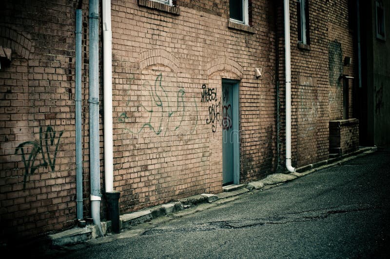 Graffiti on old brick wall stock image. Image of writing - 15576603