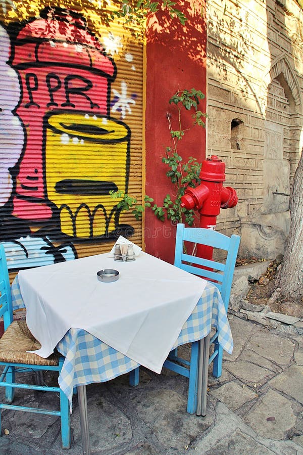Graffiti Restaurant Table, Blue Chairs, Greek Tavern, Red Fire Hydrant ...