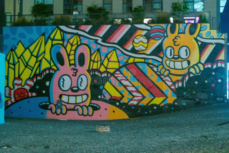 Graffiti on the Wall with Colorful Rabbits Editorial Stock Image ...