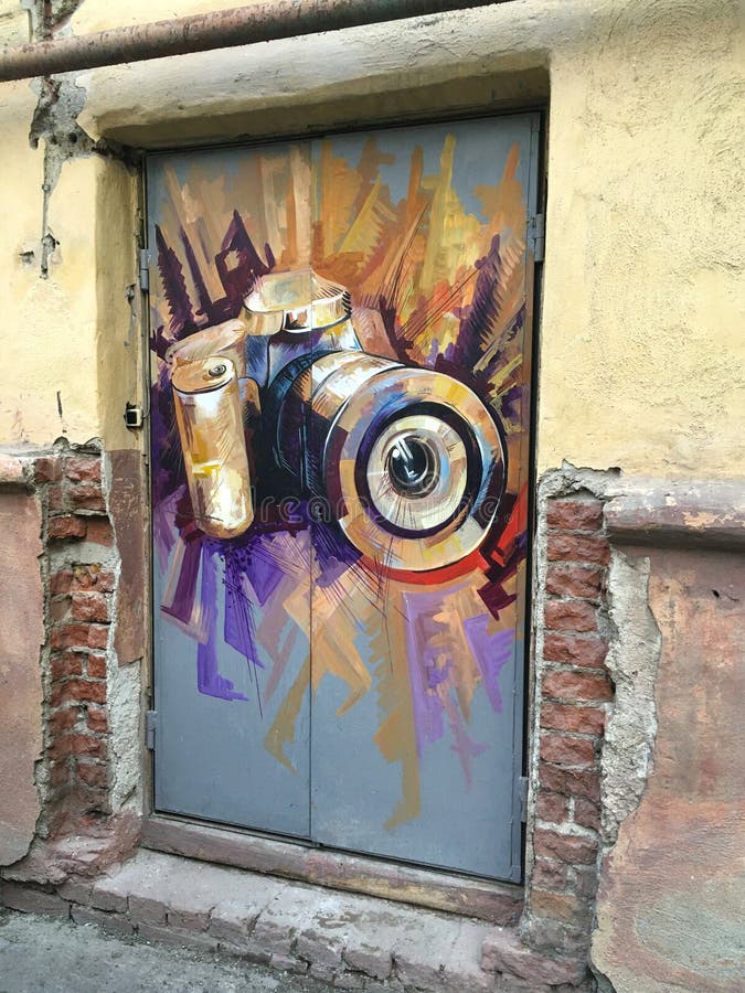 Graffiti on the Wall. the Image of the Camera. Drawing on the Whole ...