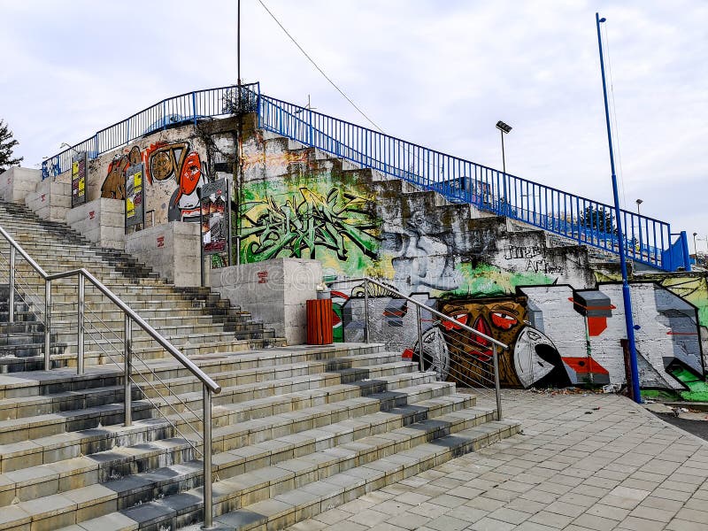 Graffiti on the Wall by the Stairs Editorial Image - Image of alley ...