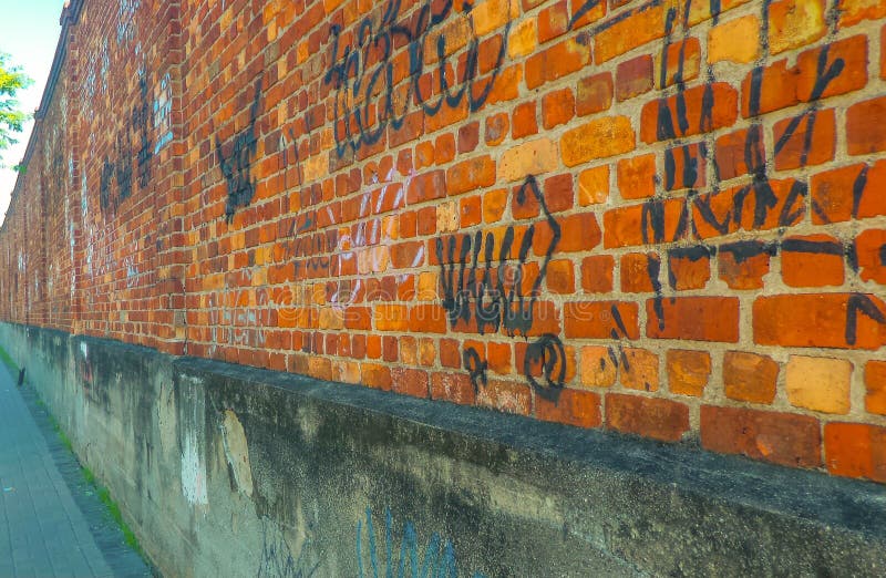 Graffitied Brick Wall in Perspective Stock Photo - Image of perspective ...