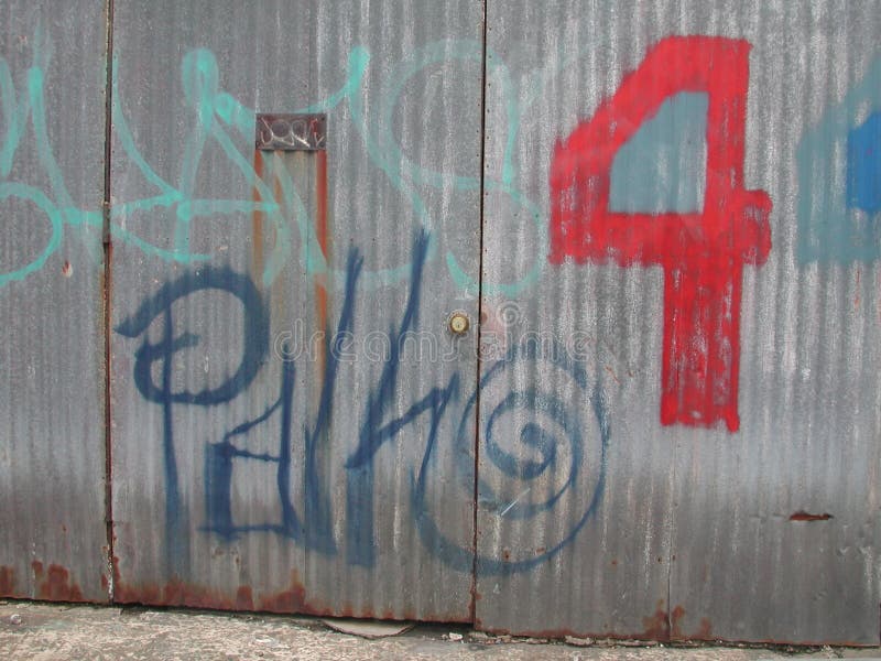 Grafitti on a Metal Wall with 4 Painted Stock Photo - Image of colorful ...