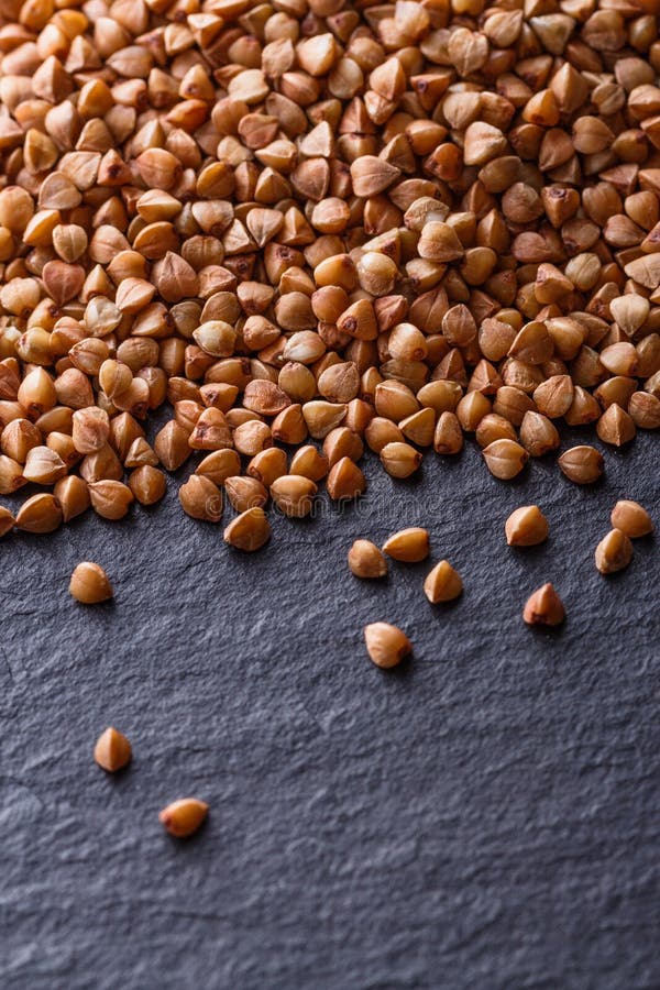 Grain Buckwheat on a Dark Stone Background Stock Photo - Image of food ...