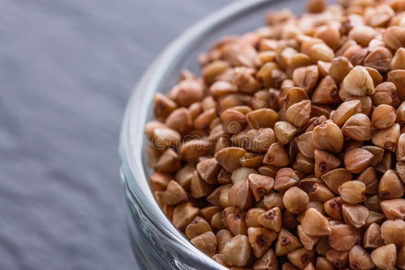 Grain Buckwheat on a Dark Stone Background Stock Photo - Image of ...