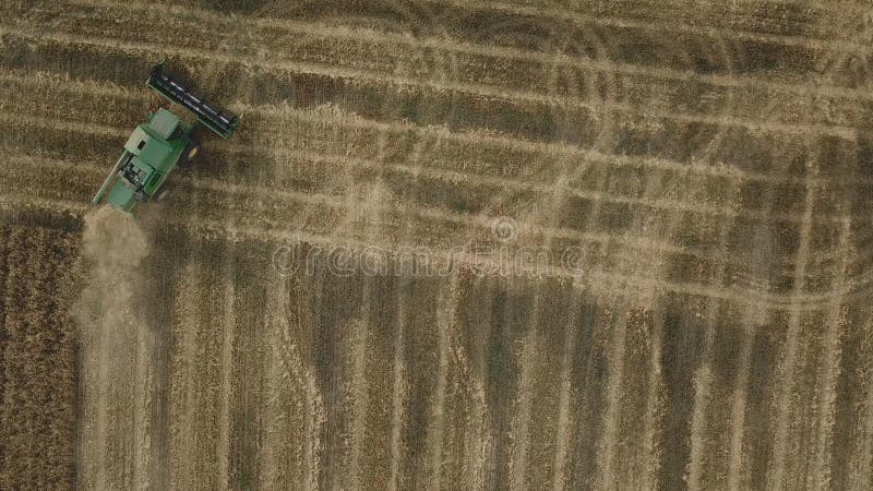Grain combine cleaning stock footage. Video of drone - 158260106