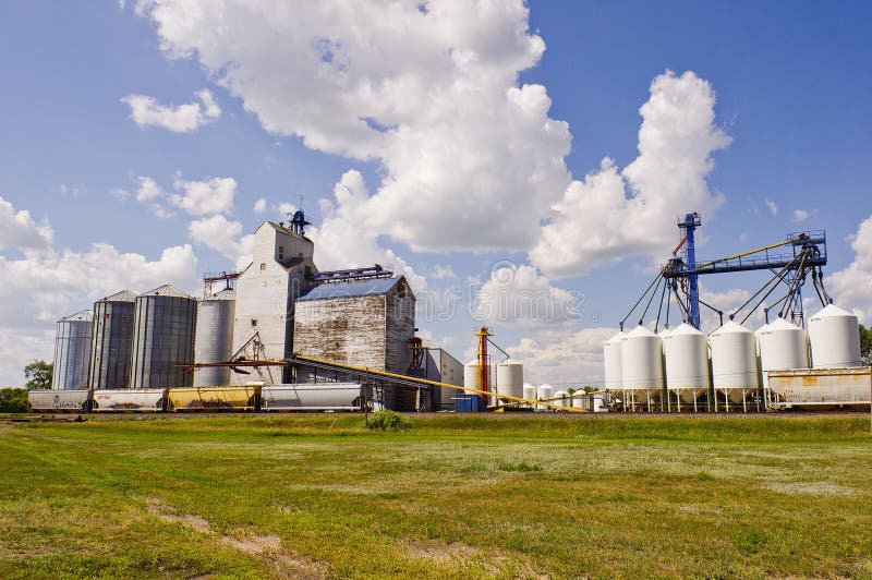 Grain elevators and silos stock photo. Image of silo - 272475848