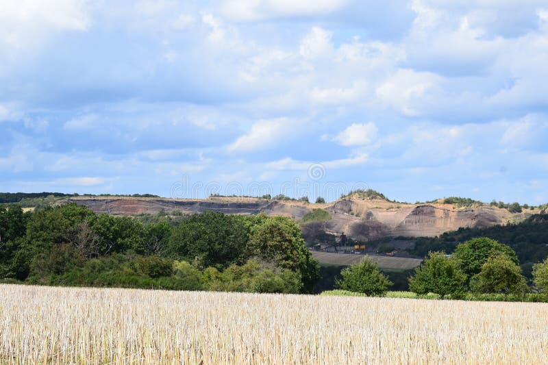 Grain Fields and a Sunny Quarry Wall Stock Image - Image of building ...