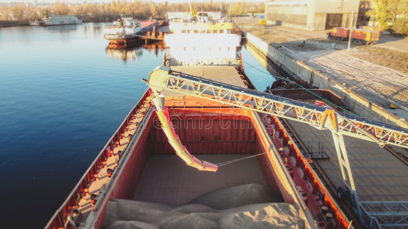 Grain Loading in Hold of Bulk Carrier Ship with Elevator Crane Closeup ...