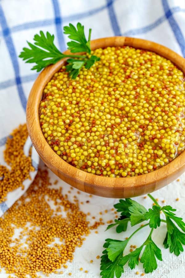 Grain Mustard in a Wooden Bowl Stock Photo - Image of dijon, grain ...