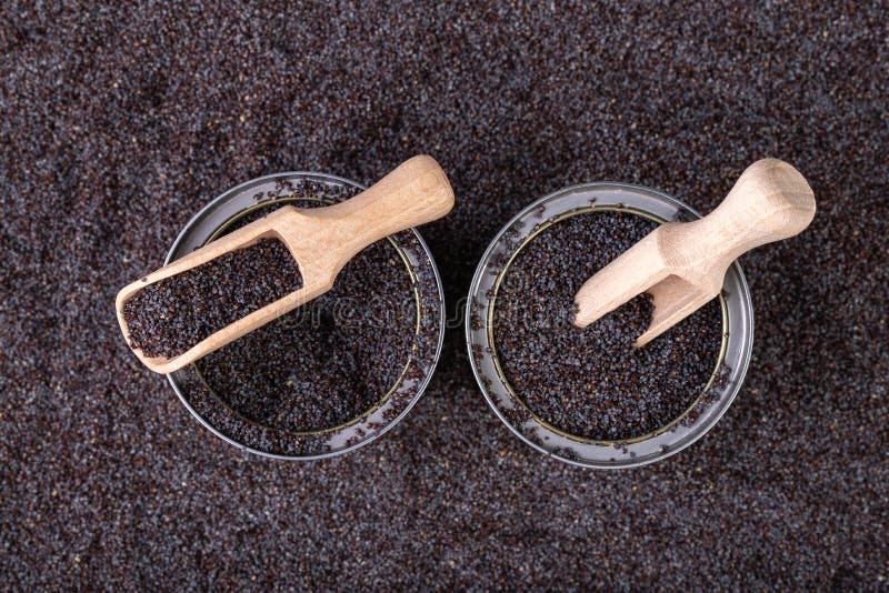 A Grain of Poppy in a Can on a Kitchen Table. Spilled Poppy Seed and ...