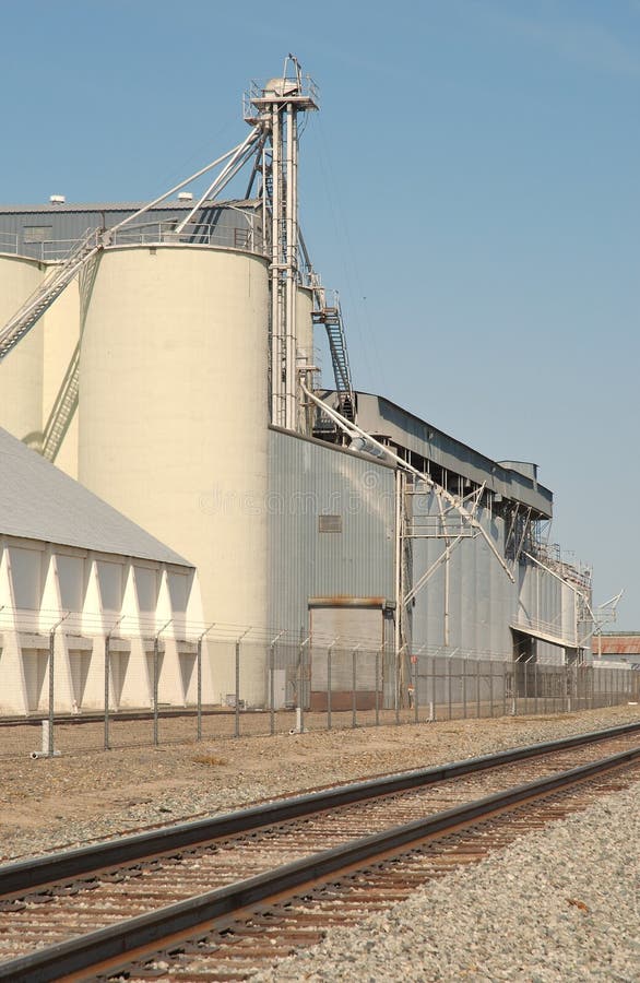 Grain Processing Plant with Railroad Tracks Stock Photo - Image of ...