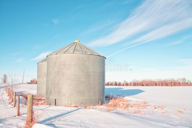 Grain Silos in the Snow stock photo. Image of silver - 48833354