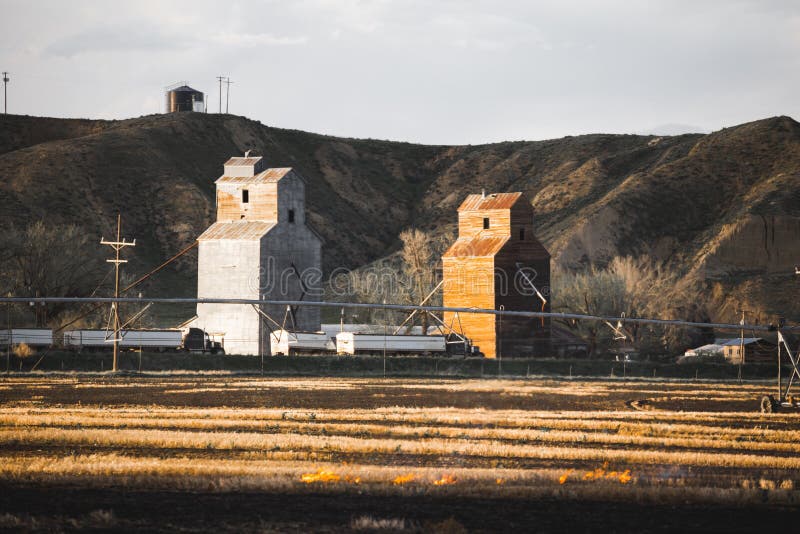 Grainery Buildings and Burning Crops Stock Image - Image of country ...