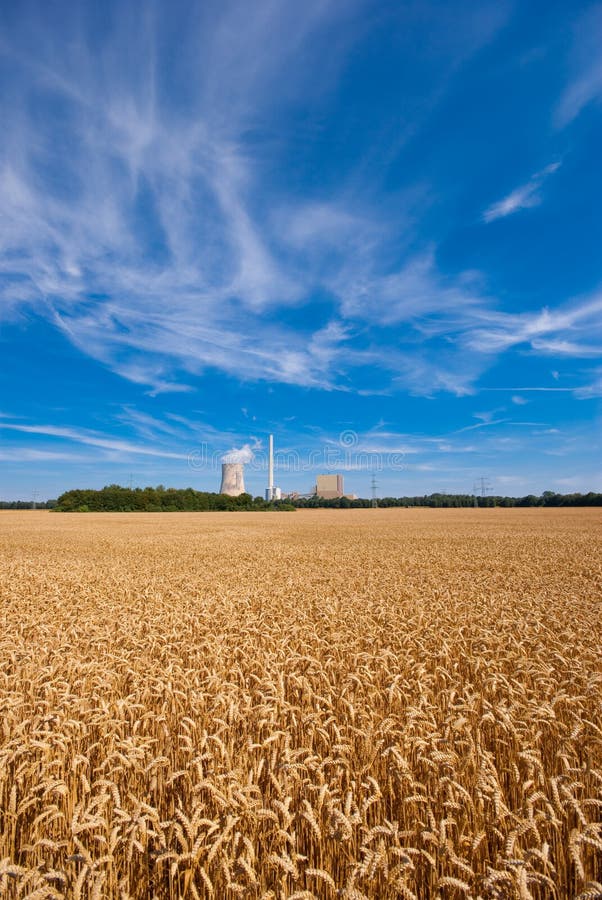 Grainfield and power plant stock photo. Image of pollution - 18867468