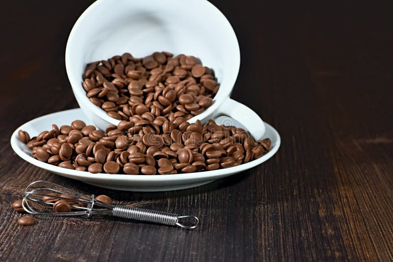 Grains Chocolate on the Brown Wooden Table. Stock Photo - Image of ...