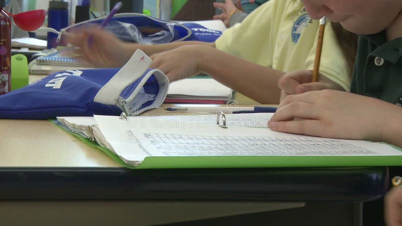 Grammar School Student Doing Homework in Classroom (6 of 6) Stock ...