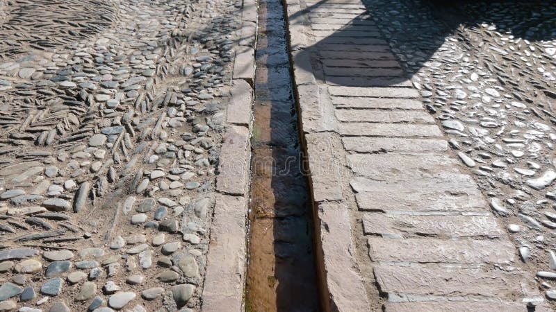 View of Bubbling Water Channel in the Alhambra with Paved Sides Stock ...
