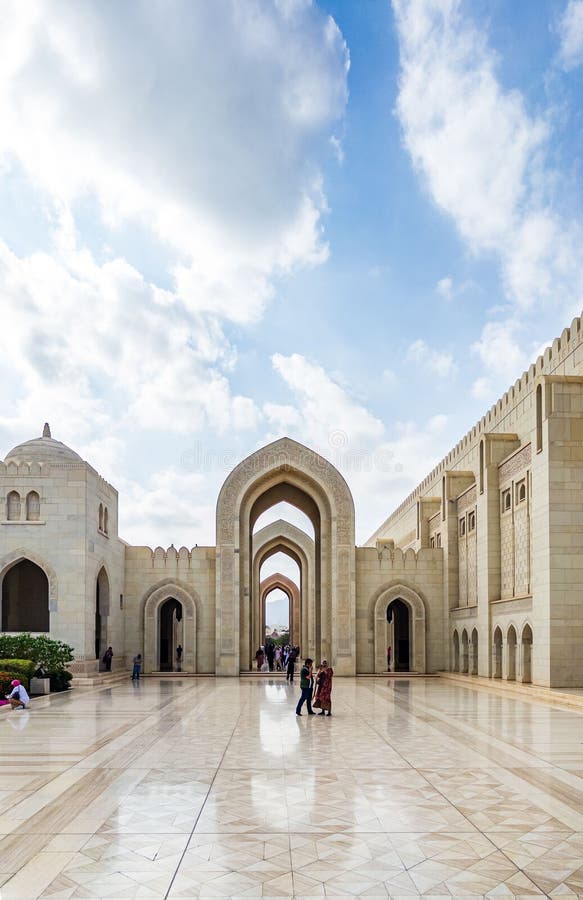 A Grand Architectural Structure with Large Arches, a Tiled Courtyard ...