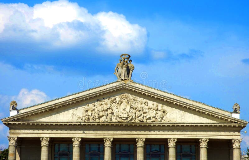A Grand Building with Hardwood Floors, Columns, Arches, and Symmetrical ...