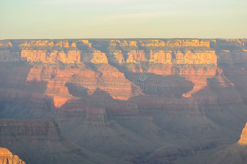 Grand Canyon Cliffs at Sunrise with Vibrant Ancient Rock Layers Stock ...