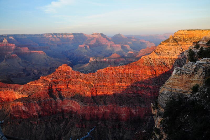 Grand Canyon S Red and Orange Cliffs Under a Sunlit Sky Stock Photo ...