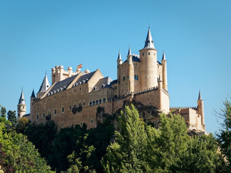 Grand Castle Perched Atop a Wooded Hill Stock Photo - Image of kingdom ...